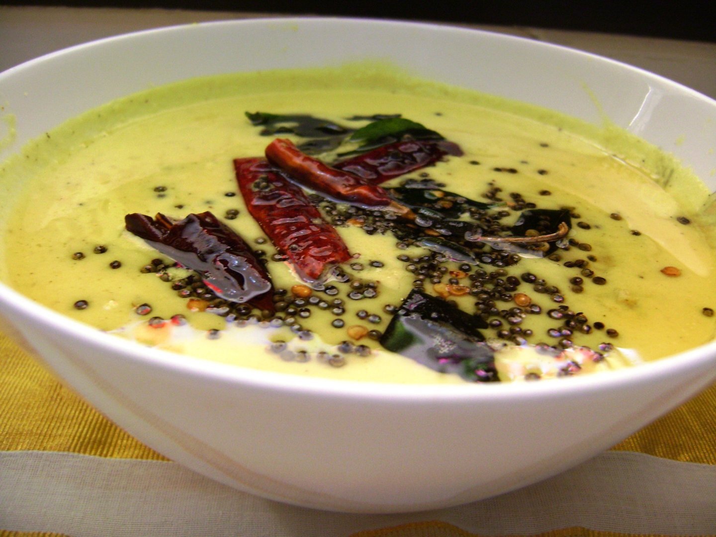 Chena pulissery (yam cooked in coconut and curd gravy)