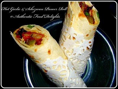 Hot garlic & schezwan paneer roll recipe