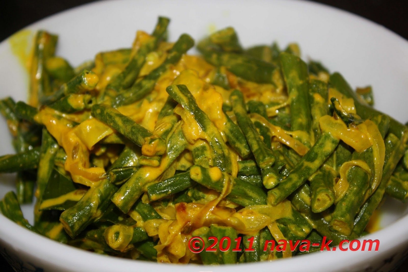 Stir-fried long beans in milk and turmeric recipe