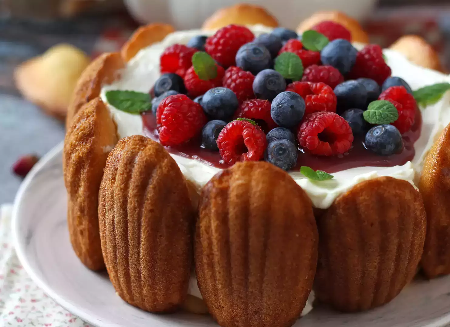 Red fruit charlotte with madeleines